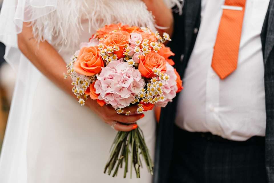 Vibrant Orange and Pink Wedding with a Robbie Williams Tribute Act ...